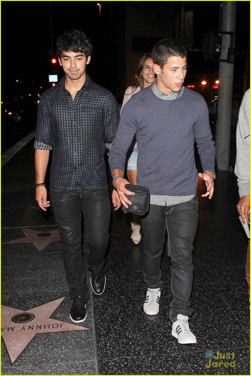 Joe & Nick Jonas: 'Dark Knight Rises' Midnight Showing in Hollywood ...