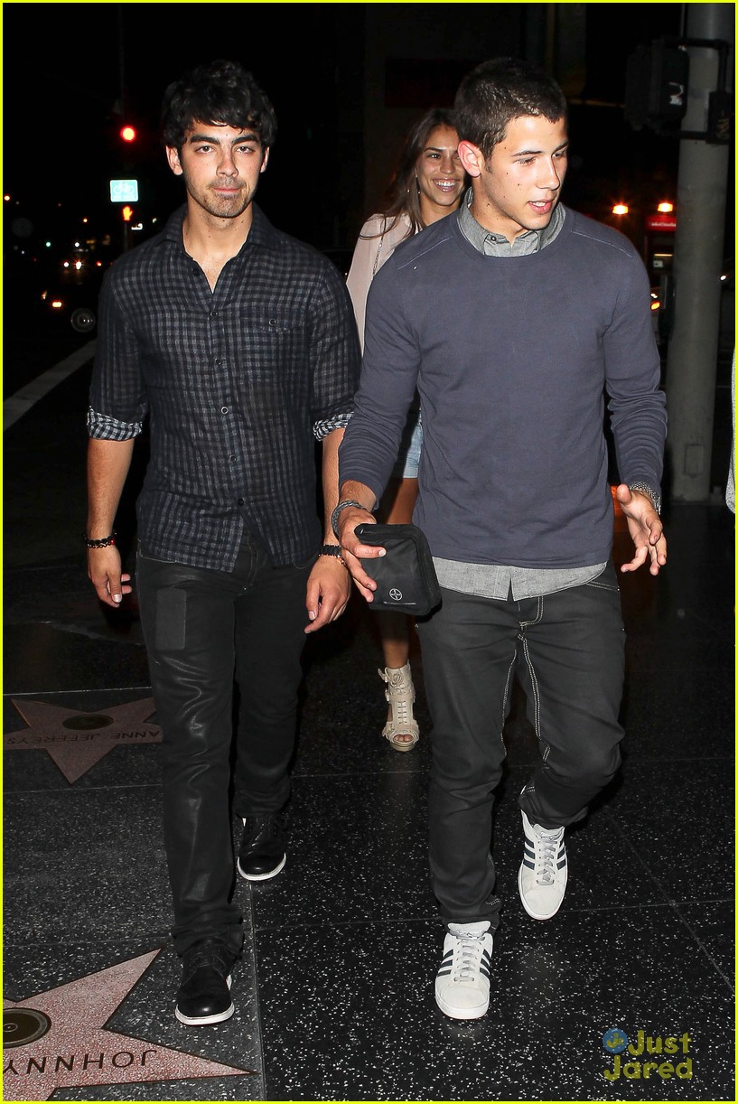 Joe & Nick Jonas: 'Dark Knight Rises' Midnight Showing in Hollywood ...