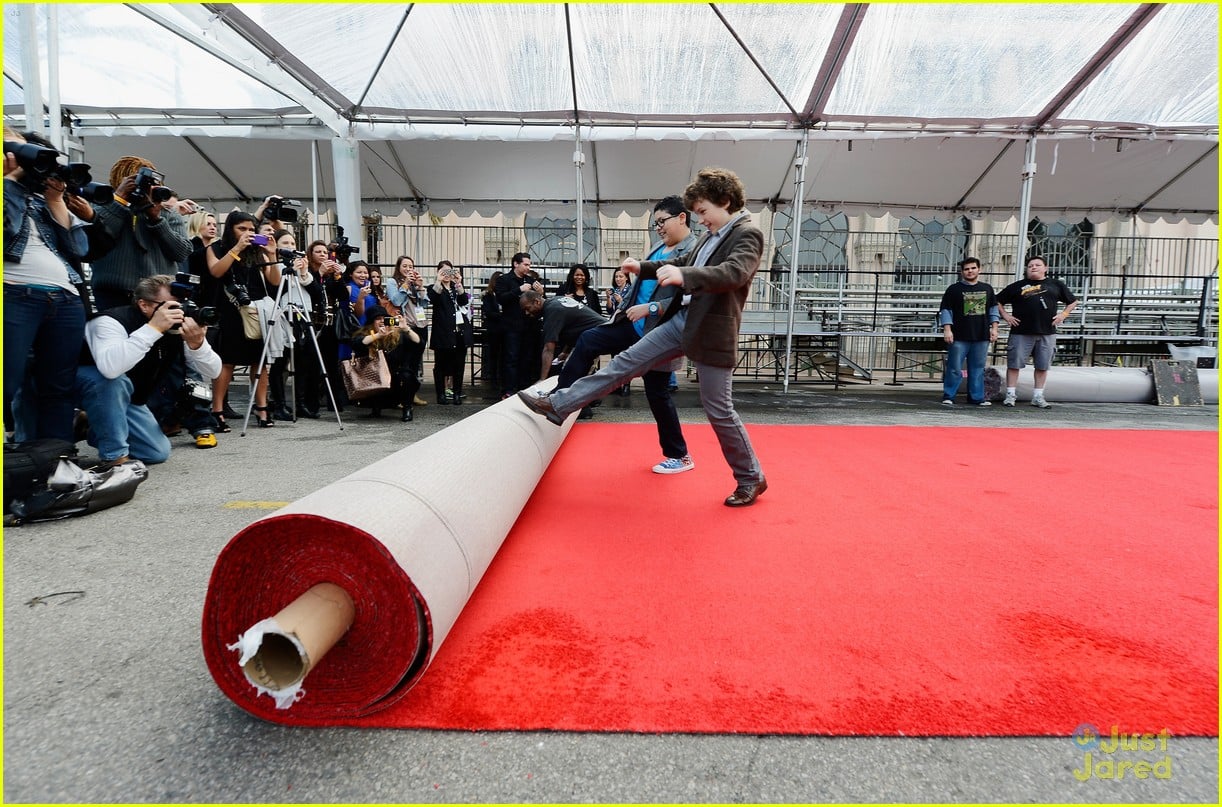 Full Sized Photo of rico rodriguez nolan gould red carpet roll out sag ...