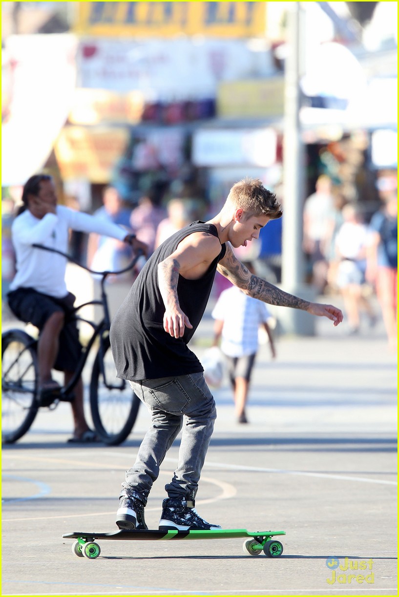 Justin Bieber Skateboards, Slam Dunks a Basketball, & Plays Tennis All ...