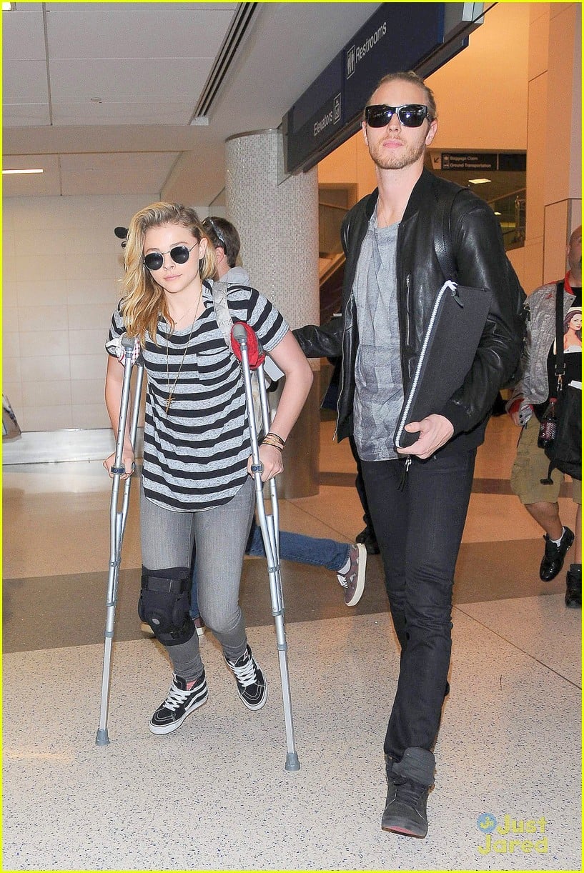Chloe Moretz Uses Crutches For Knee Injury After Arriving Back In Los ...