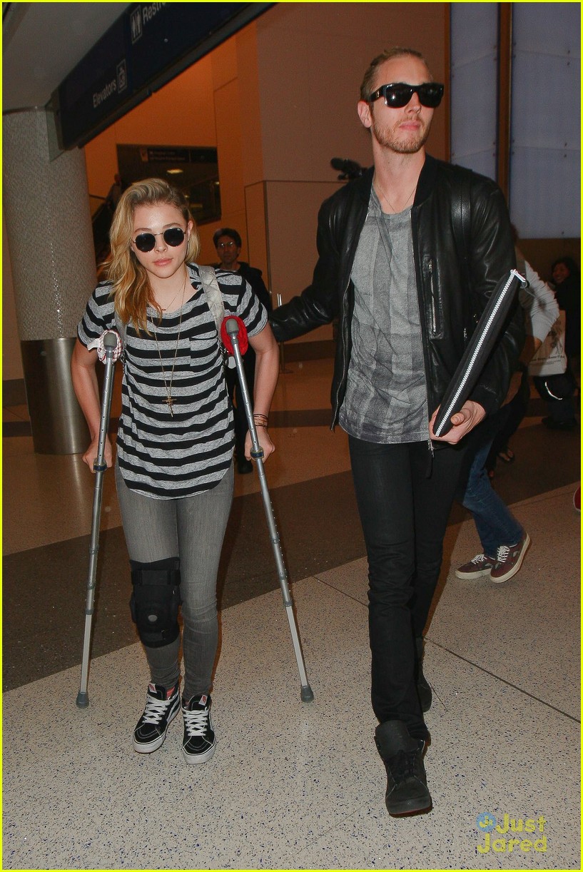 Chloe Moretz Uses Crutches For Knee Injury After Arriving Back In Los ...