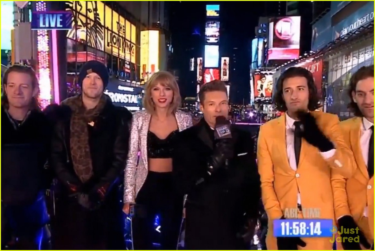 Taylor Swift Freezes on New Year's Eve & Warms Up with Ryan Seacrest's ...