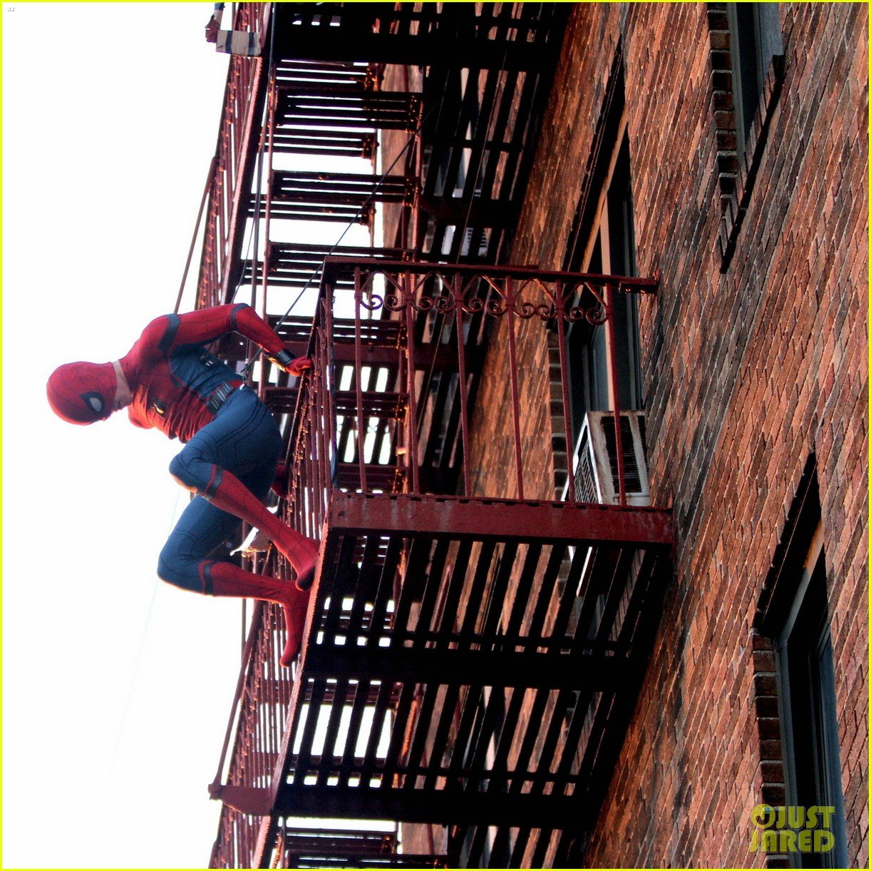 Full Sized Photo of tom holland performs his own spider man stunts on ...
