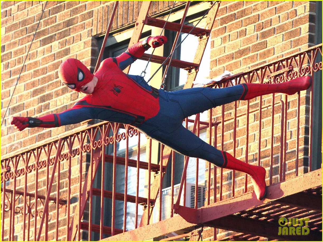 Full Sized Photo of tom holland performs his own spider man stunts on ...