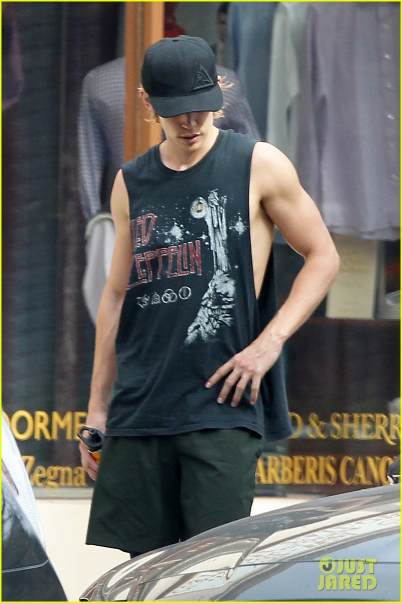 Full Sized Photo of austin butler shows off his muscles while leaving ...