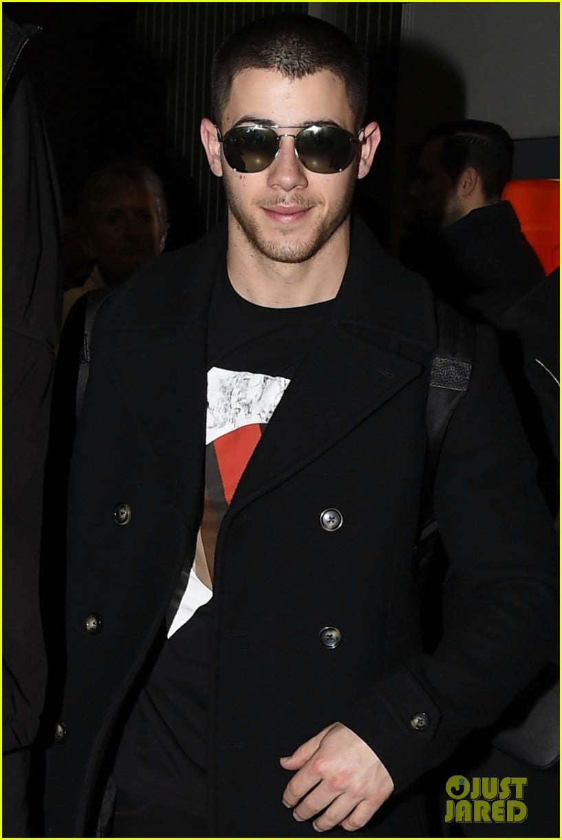 Nick Jonas & Emma Roberts Check Out the Paris Fashion Scene | Photo ...
