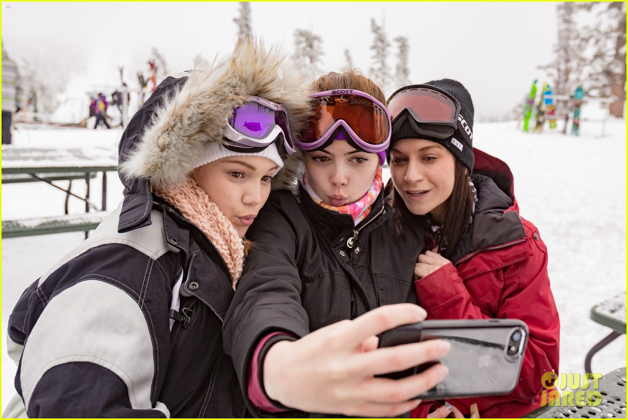 Olivia Holt and Boyfriend Ray Kearin Kiss & Cuddle On Their Ski Trip ...