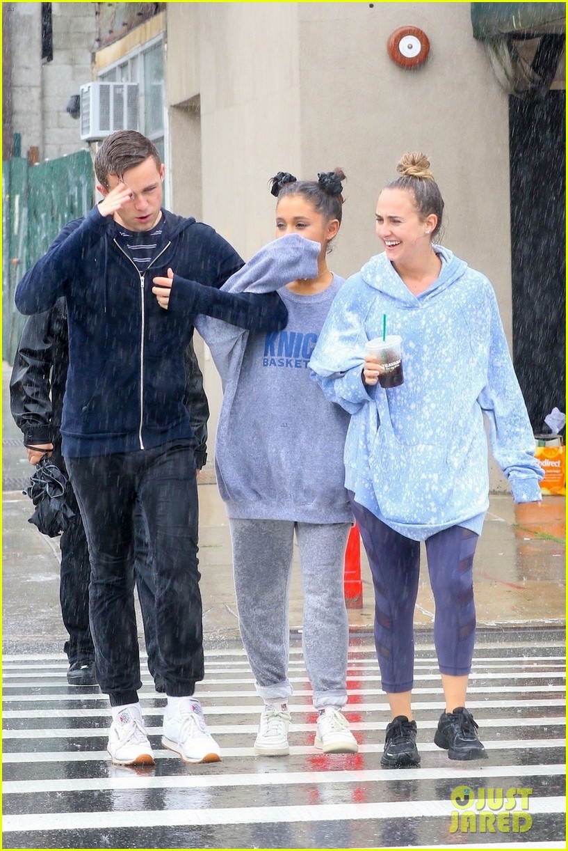 Ariana Grande Walks Through the Pouring Rain with Her Best Friends ...