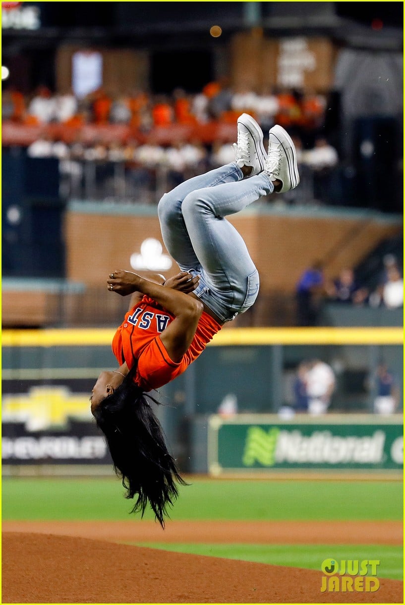 Full Sized Photo of simone biles does backflip before throwing first ...