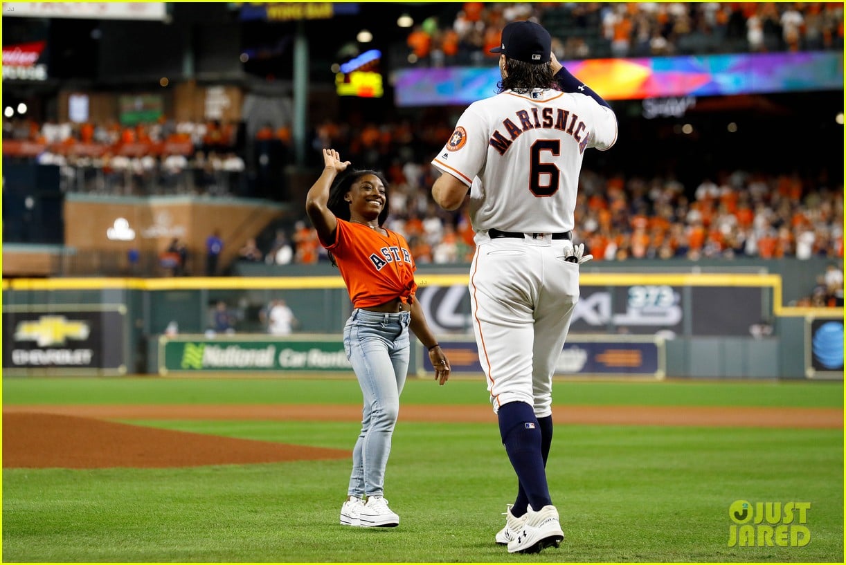 Full Sized Photo of simone biles does backflip before throwing first ...