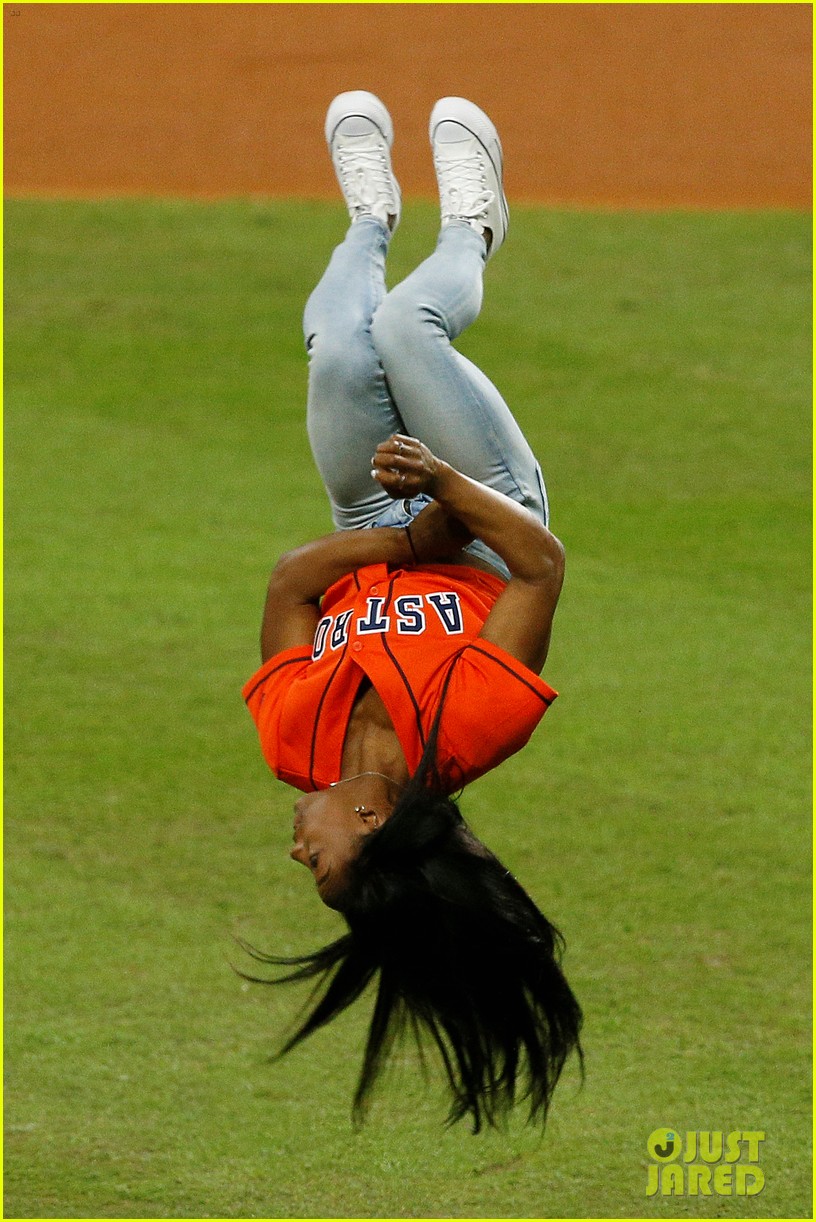 Full Sized Photo of simone biles does backflip before throwing first ...