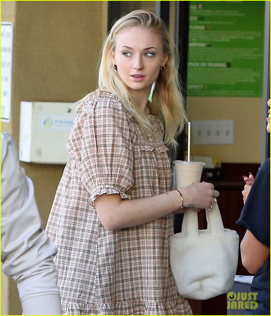 Sophie Turner Wears a Cute Dress with White Boots in These New Photos ...