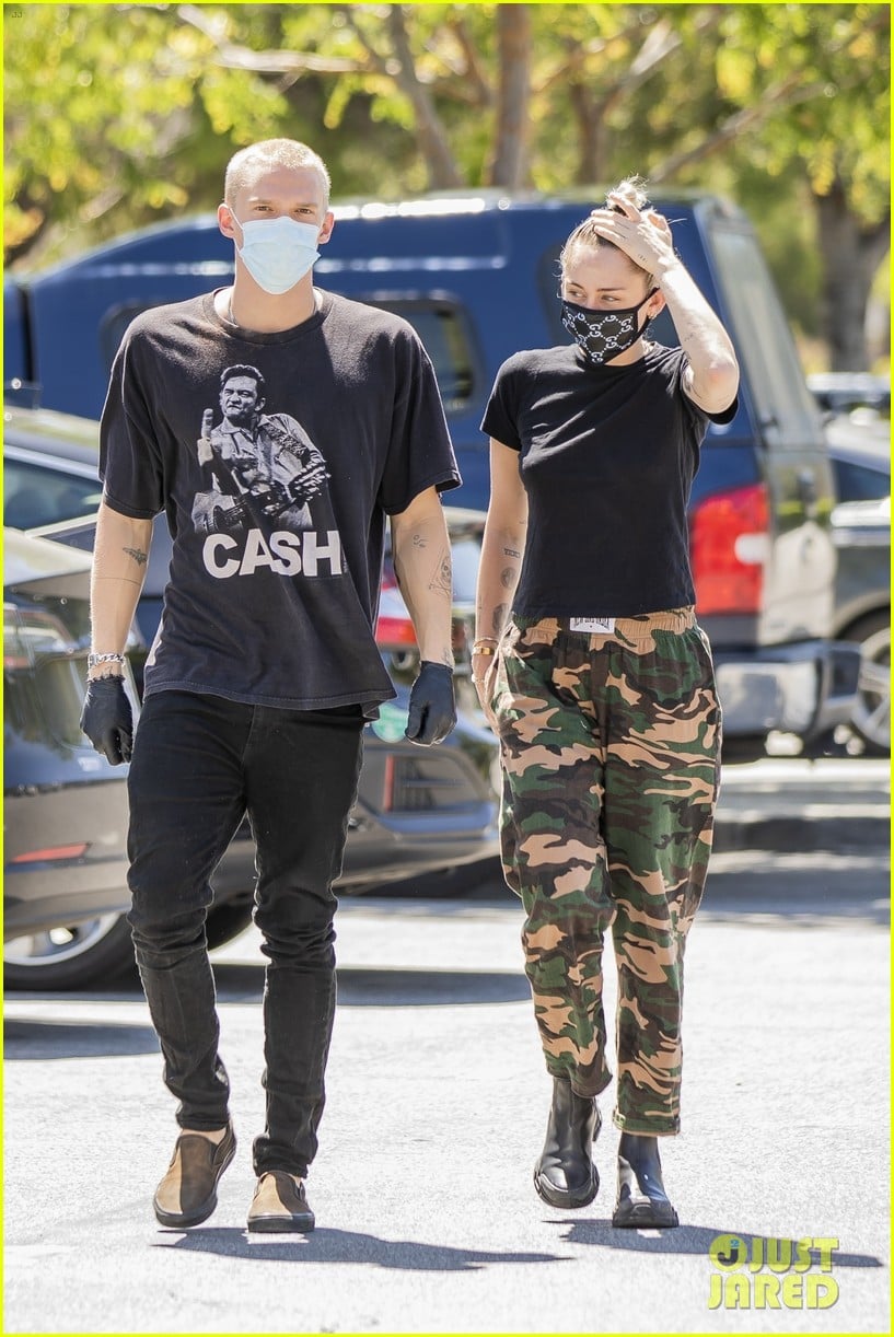 Miley Cyrus Wears a Gucci Face Mask for an Outing with Cody Simpson ...