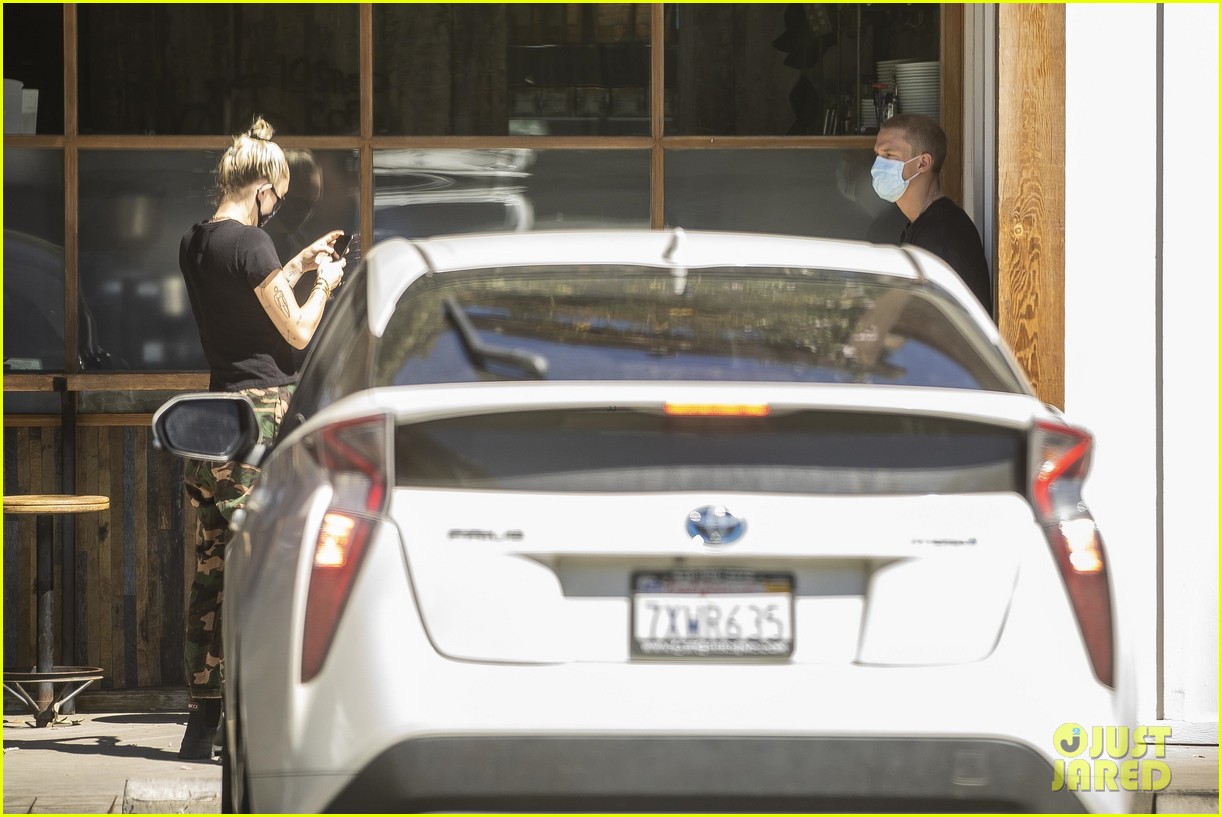 Miley Cyrus Wears a Gucci Face Mask for an Outing with Cody Simpson ...