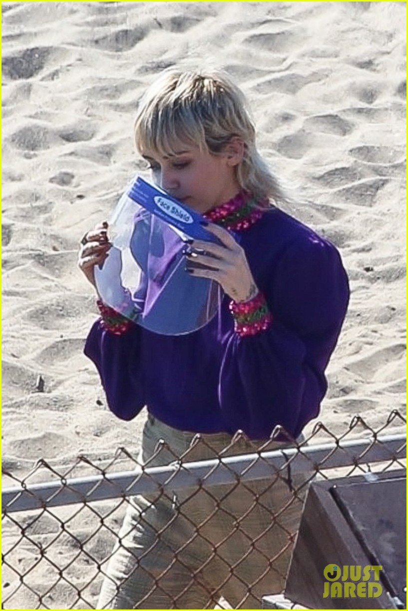 Full Sized Photo of miley cyrus filming new music video at beach 59 ...