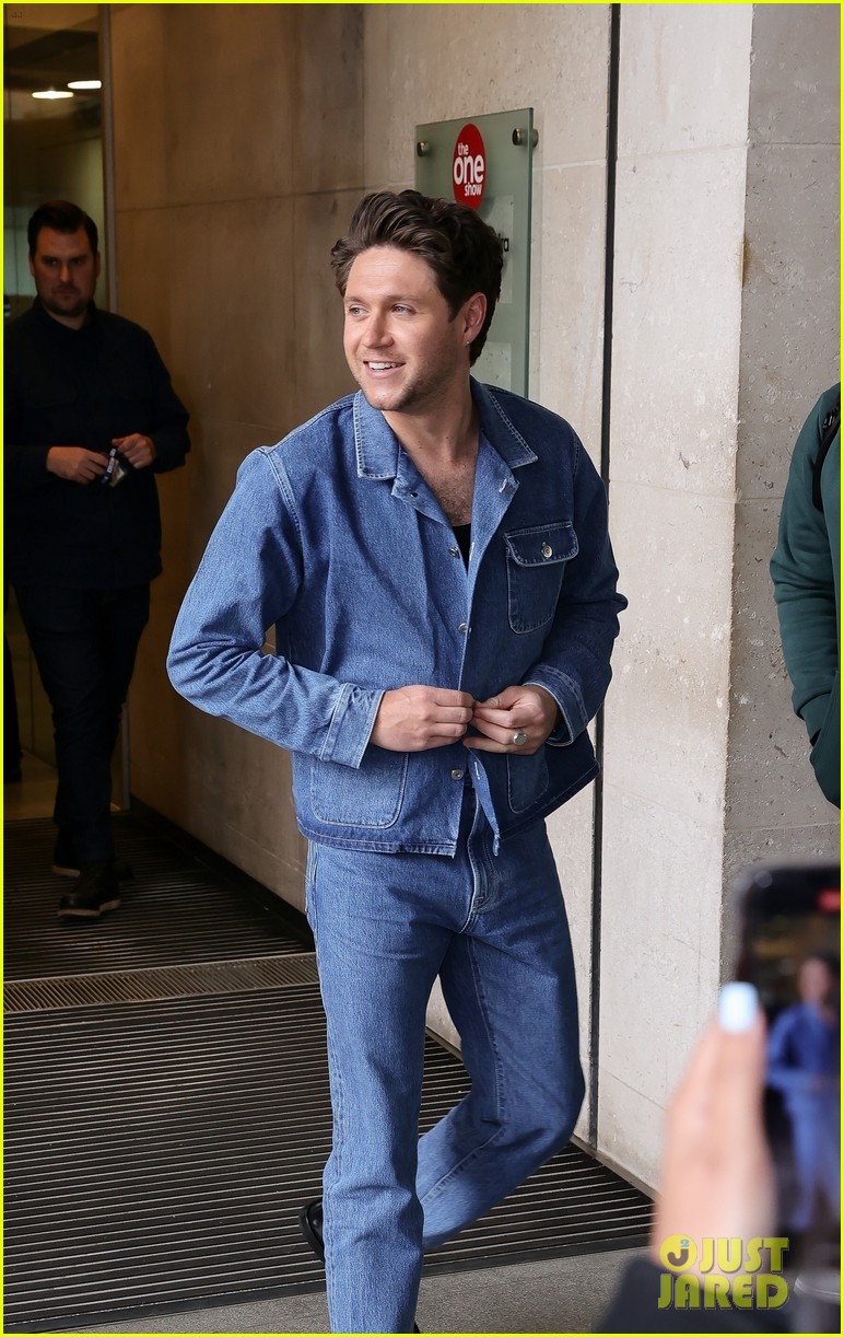 Niall Horan Rocks Double Denim & Accepts Flowers From a Fan Ahead of ...