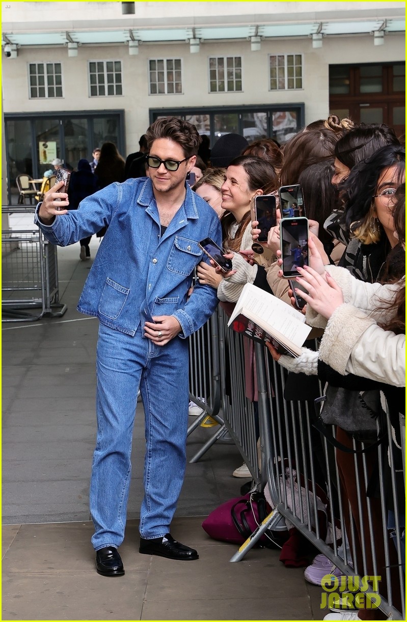 Niall Horan Rocks Double Denim & Accepts Flowers From a Fan Ahead of ...