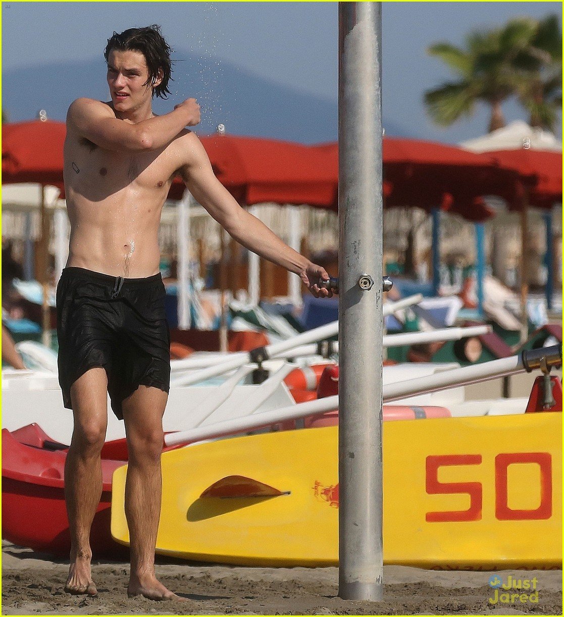 Louis Partridge Soaks Up the Sun During Time Off in Italy - See the ...