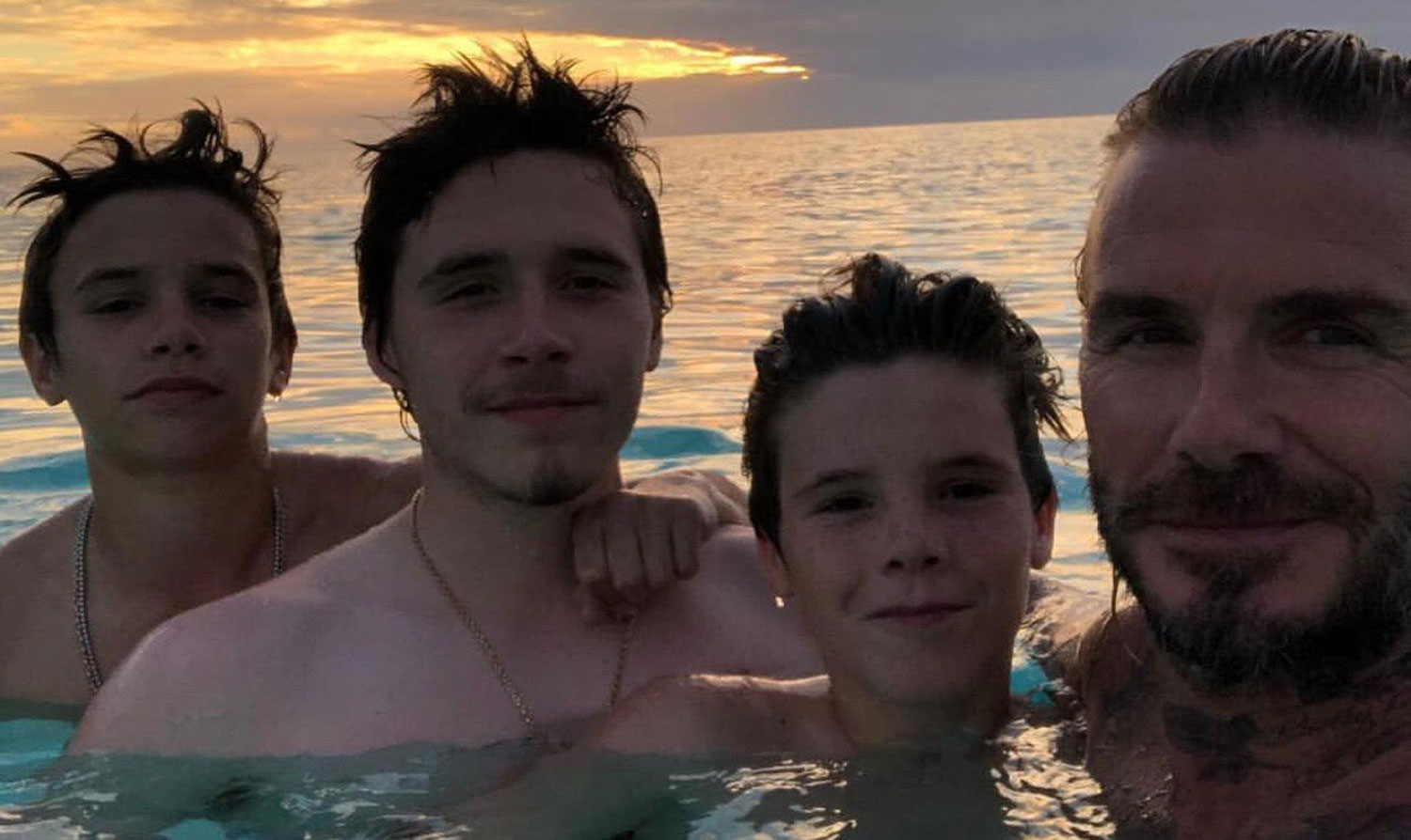 Brooklyn Beckham Shares Shirtless Pics, Watches Sunset with Dad David ...