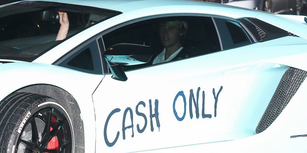 Justin Bieber Is All Smiles While Stepping Out of Church to His Spray ...