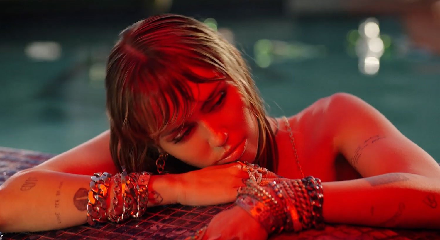 Miley Cyrus is Done With Partying in ‘Slide Away’ Music Video – Watch ...