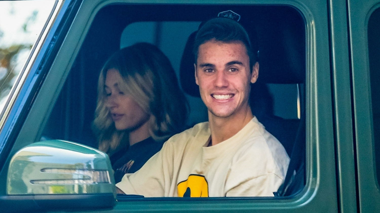 Justin Bieber Flashes a Grin While Driving Around With Wife Hailey ...
